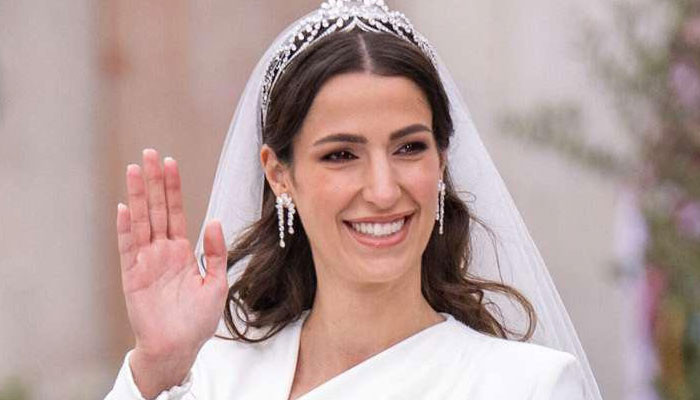 Jordan's princess Rajwa displays growing baby bump on her wedding ...