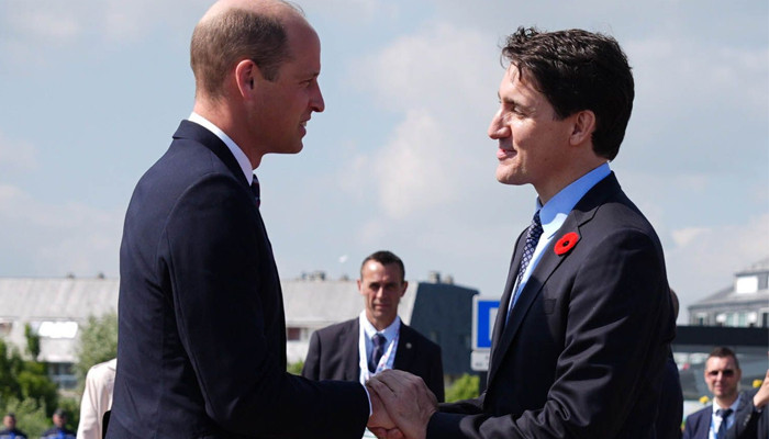 Prince William immediately swooped by PM Justin Trudeau at D-Day event