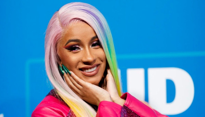 Cardi B drops rare family photos after revealing bold piercing