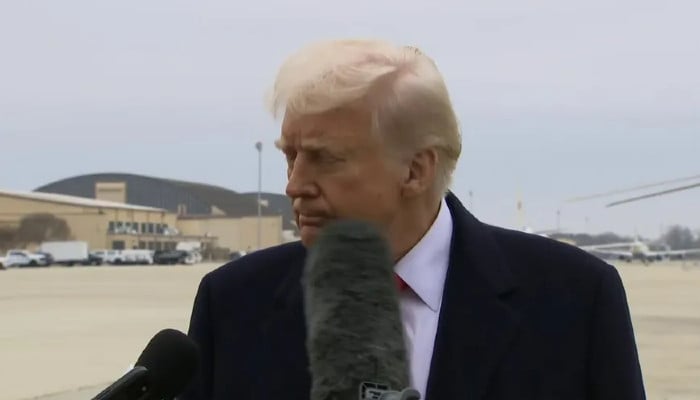Trump gives reporter 'death stare' after microphone hits his face: Watch